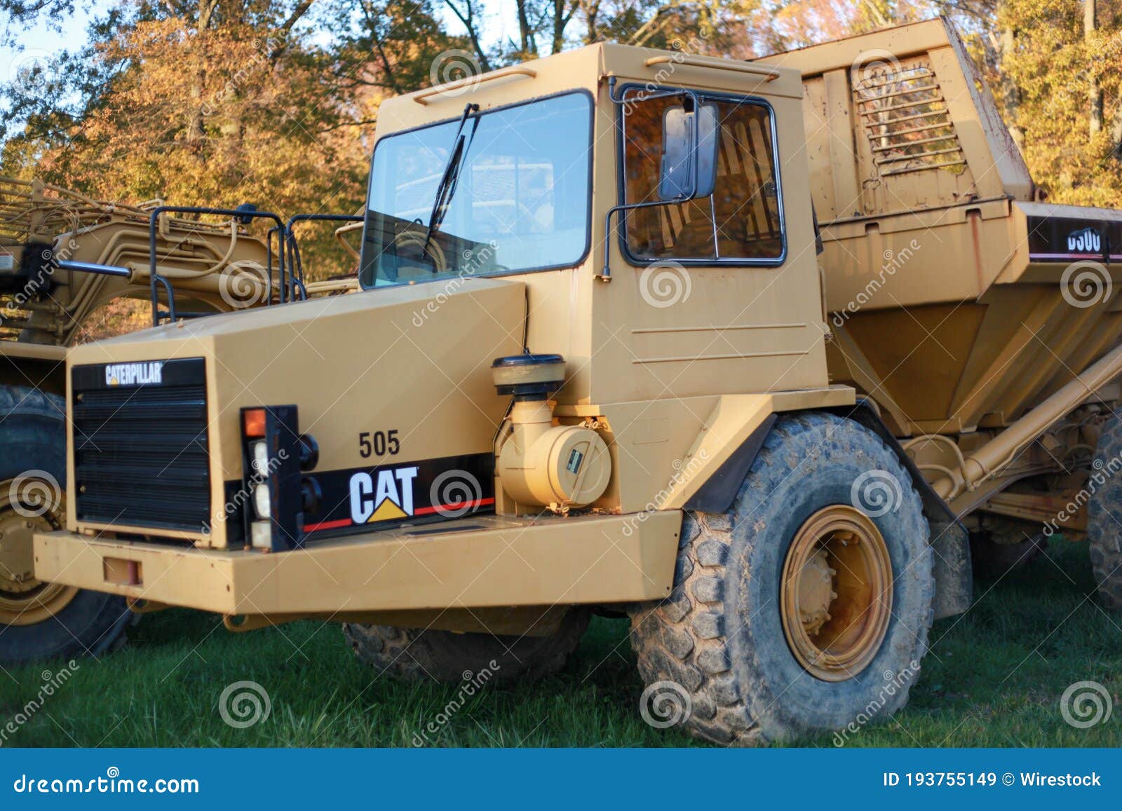 CAT Construction Vehicle editorial stock image. Image of trees - 193755149