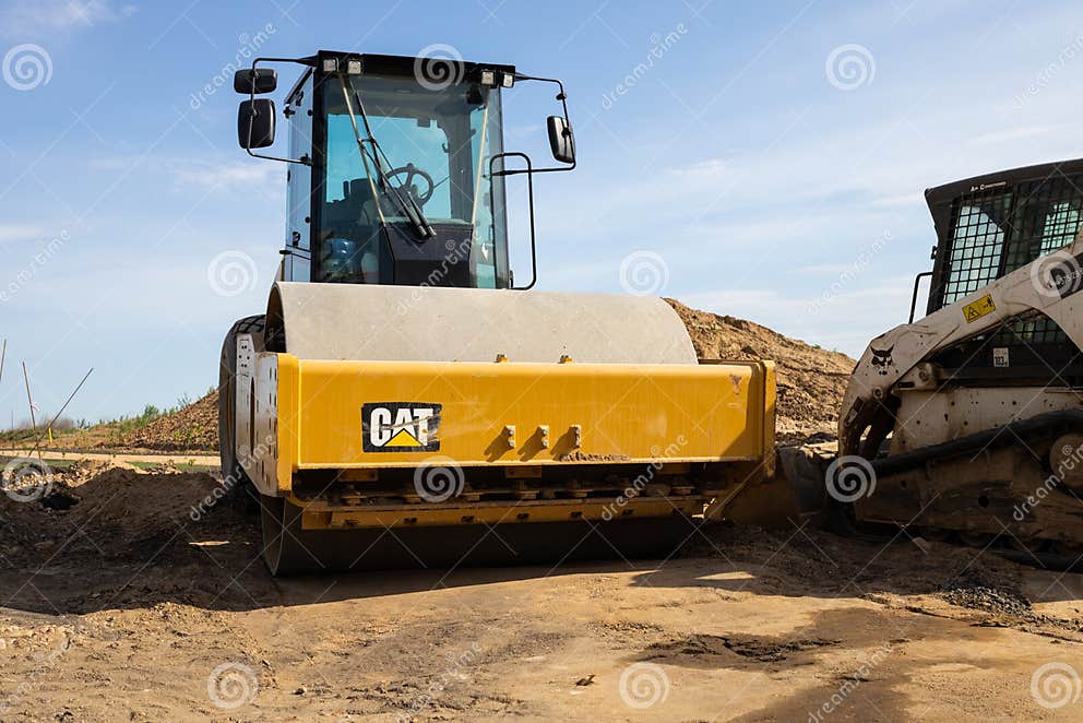 Cat road roller editorial stock image. Image of work - 288867769