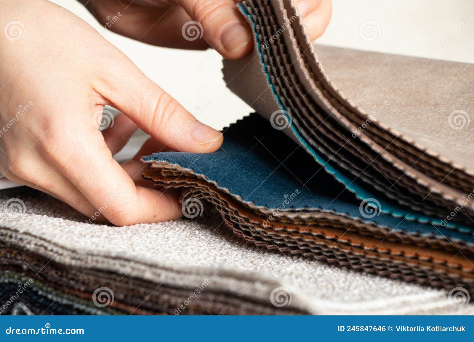 A Catalog of Different Colors of Fabrics in the Hands of a Girl for the ...