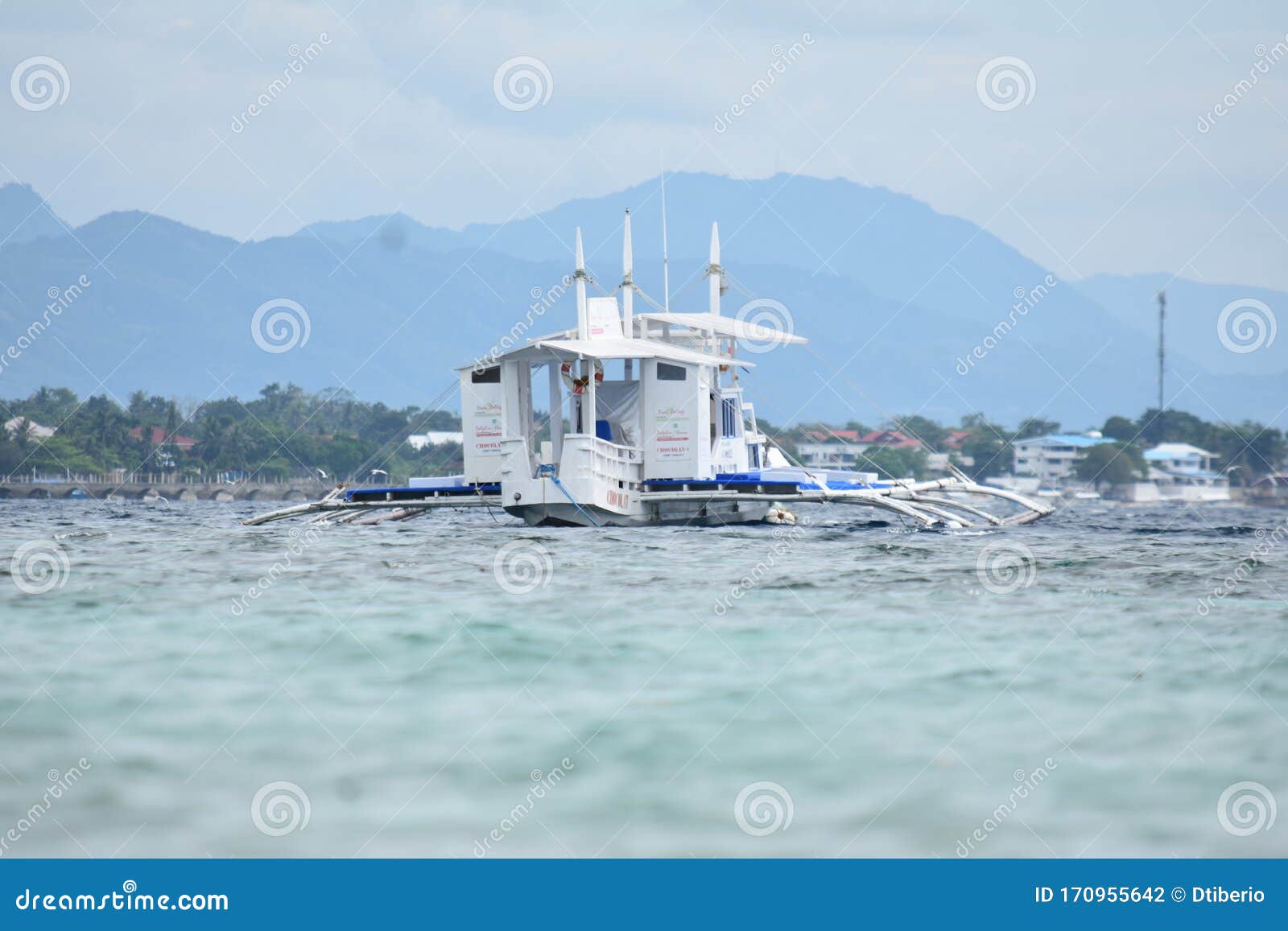 A Catamaran Boat Floating in Ocean Stock Photo - Image of boating ...