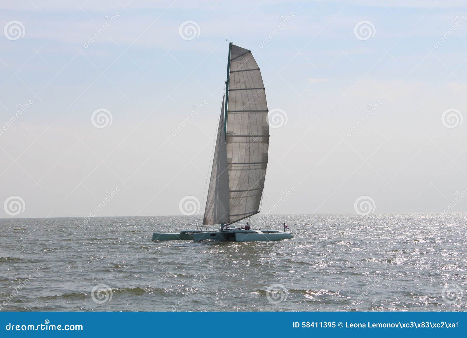 Catamaran Sailing in the Morning Light Stock Image - Image of clouds ...
