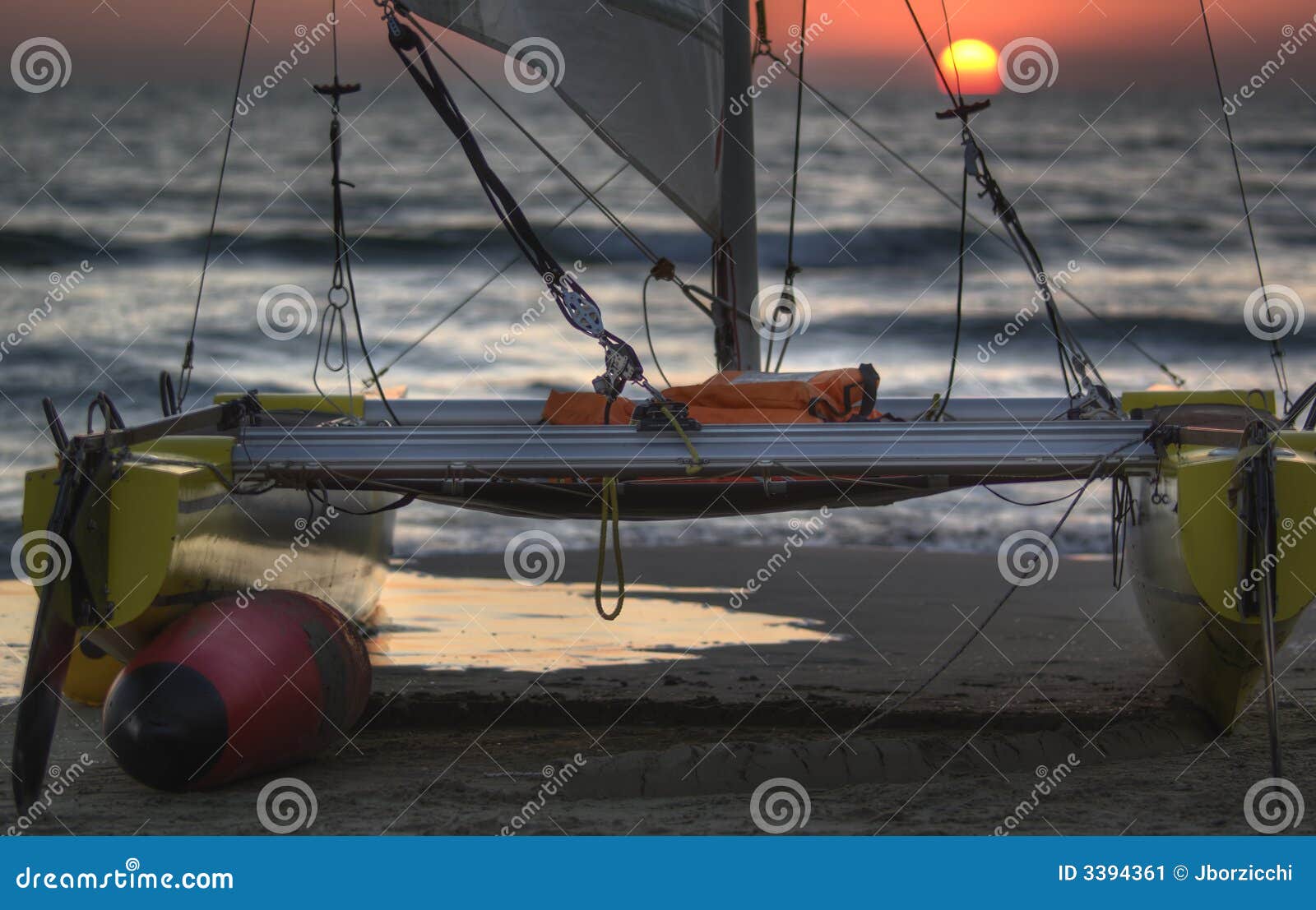 Catamaran at sunset stock image. Image of ocean, sailing - 3394361