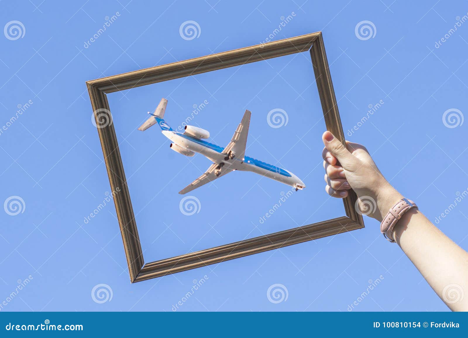 Catch a plane in a frame stock photo. Image of flying - 100810154