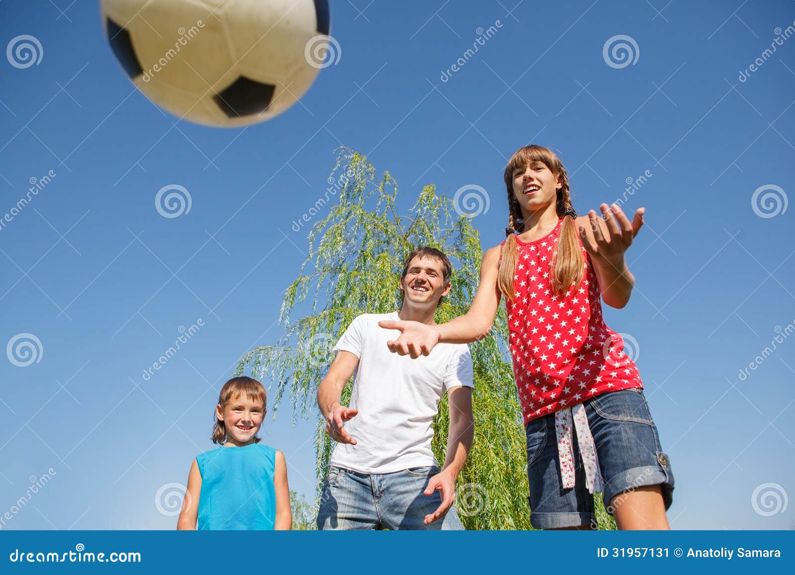 Catching a ball stock image. Image of summer, family - 31957131
