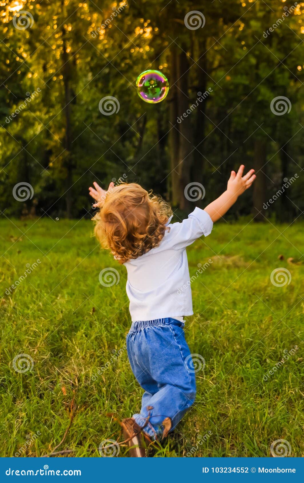 Catching Bubbles stock photo. Image of expression, baby - 103234552