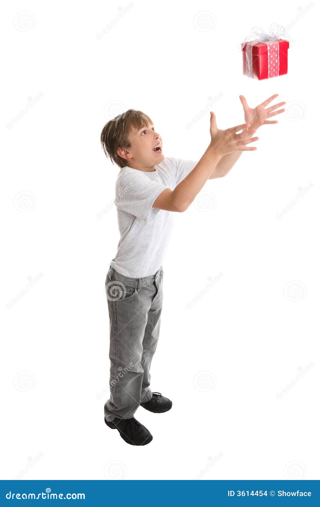 Catching a falling present stock photo. Image of child - 3614454