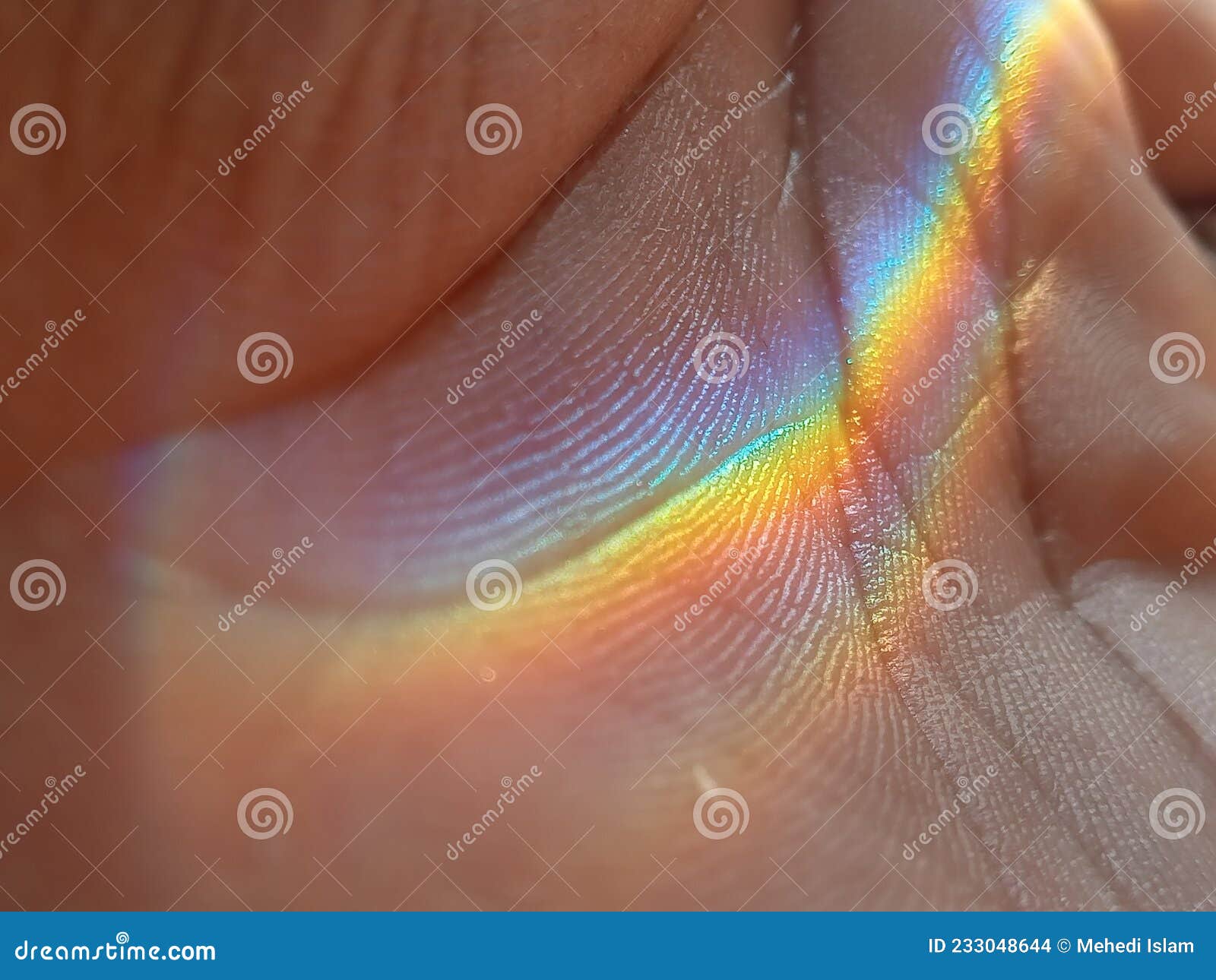 Catching Rainbow in a Hand stock photo. Image of leaf - 233048644