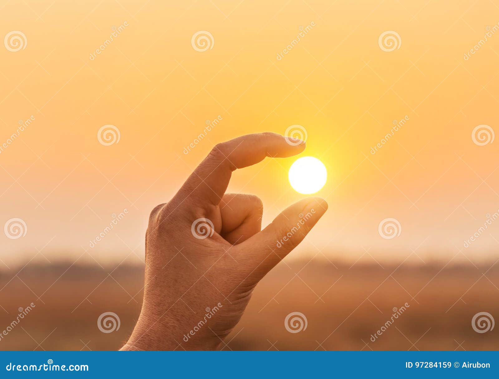 Catching the Sun at Sunset in Fingers Stock Image - Image of sign ...