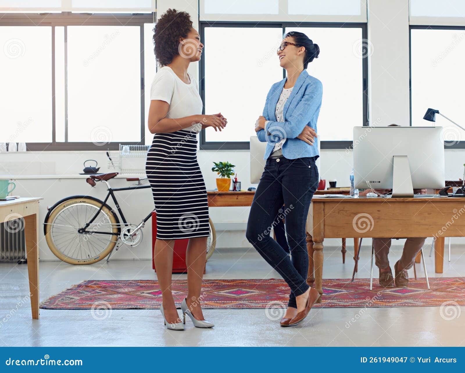 Catching Up at Work. Two Colleagues Having a Conversation in an Office ...