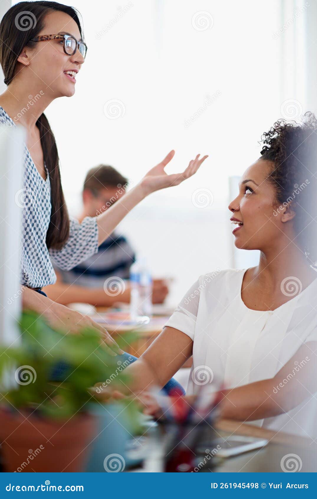 Catching Up before the Workday. Two Colleagues Having a Conversation at ...