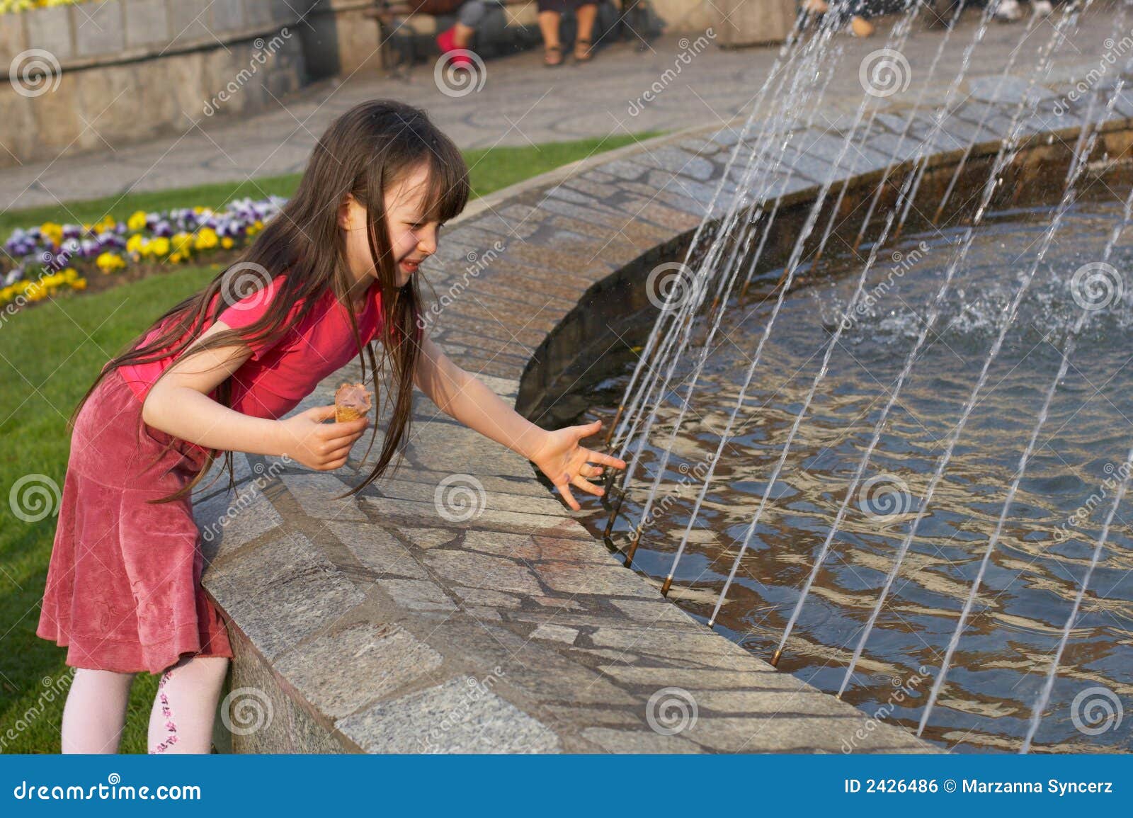 Catching Water stock photo. Image of reaching, spray, play - 2426486