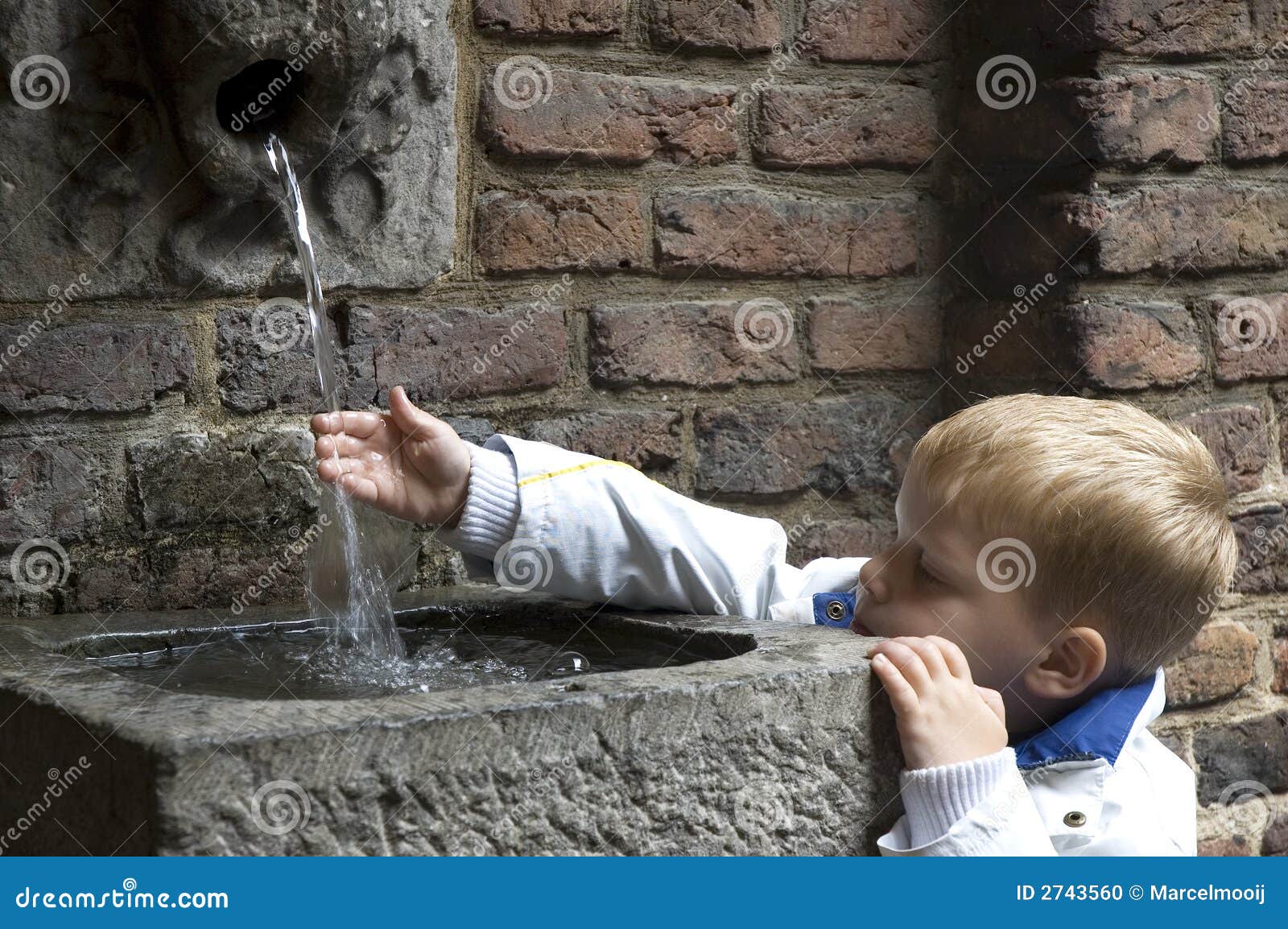 Catching the Water stock photo. Image of child, play, stream - 2743560