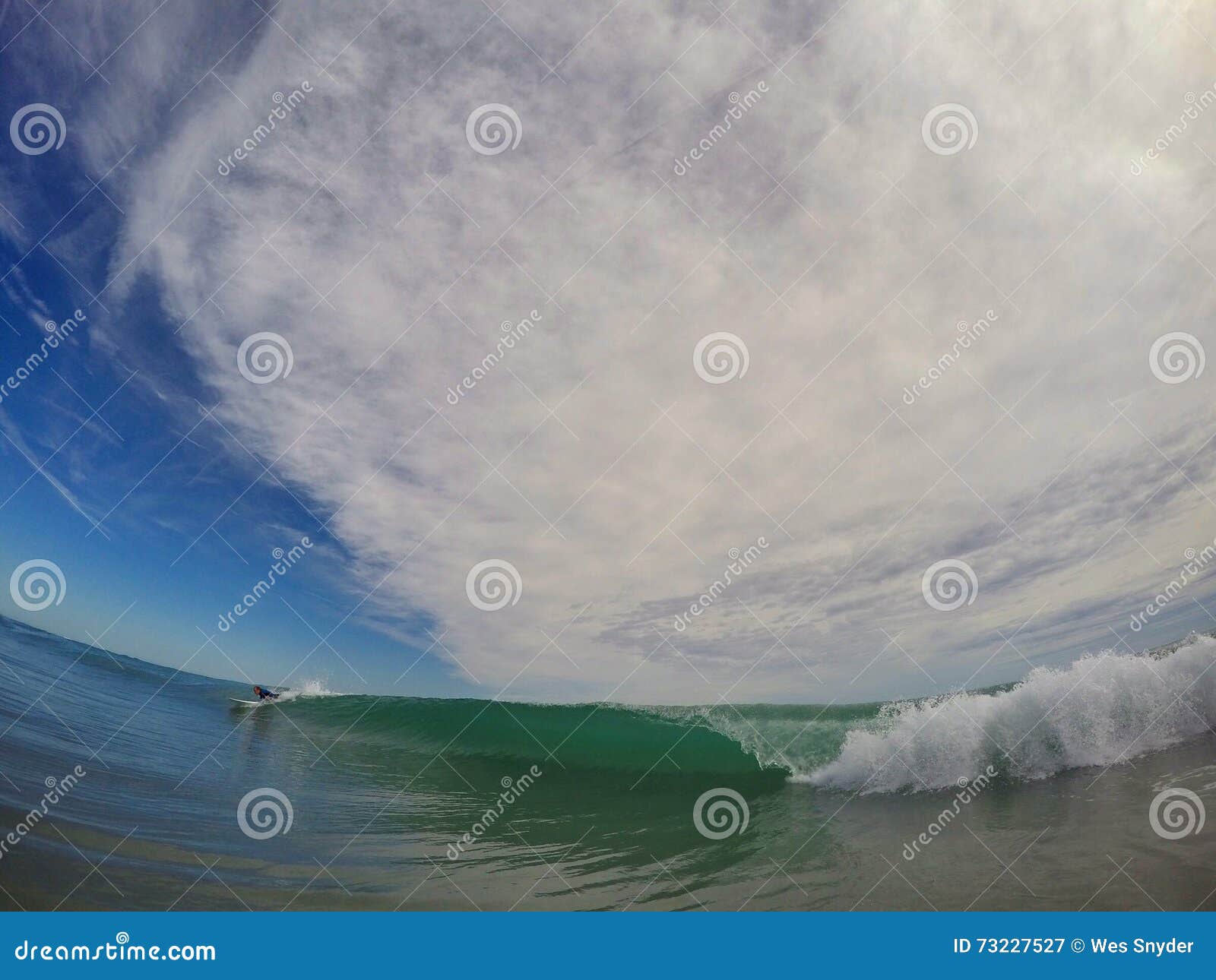 Catching a wave Surfing stock image. Image of surfing - 73227527