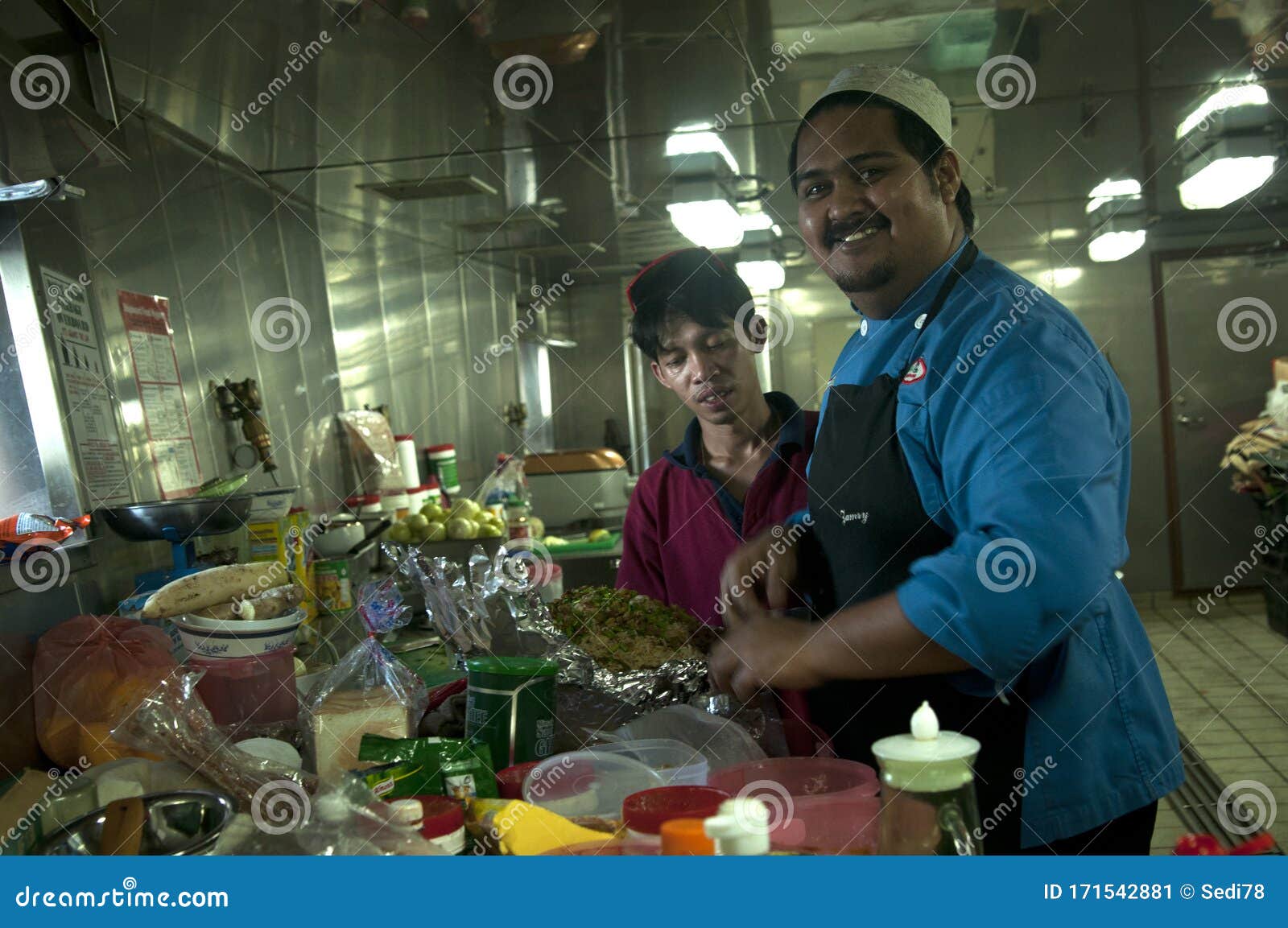 Smiling Catering Crew in Galley Editorial Photo - Image of commencing ...