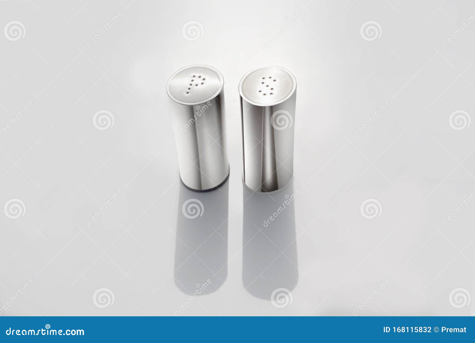Salt and Pepper on the Sun on Table Stock Photo - Image of pair ...