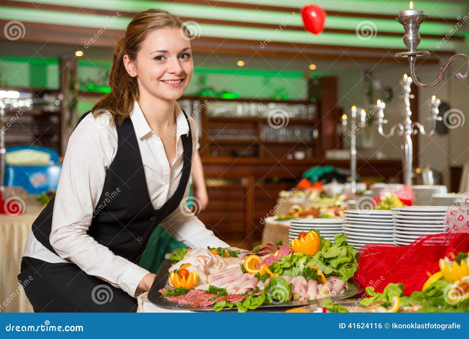 Catering Service Employee Preparing a Buffet Stock Photo - Image of ...