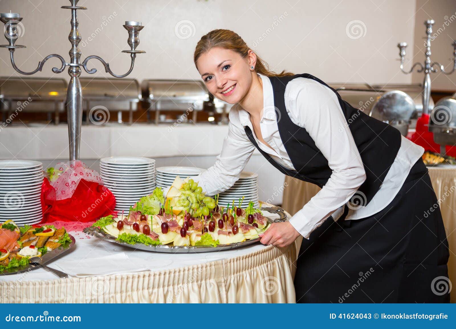 Catering Service Employee or Waitress Preparing a Buffet Stock Image ...