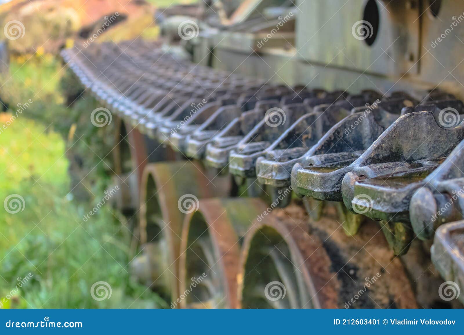 The Caterpillar of an Old Soviet Tank on the Background of Rusty Wheels ...