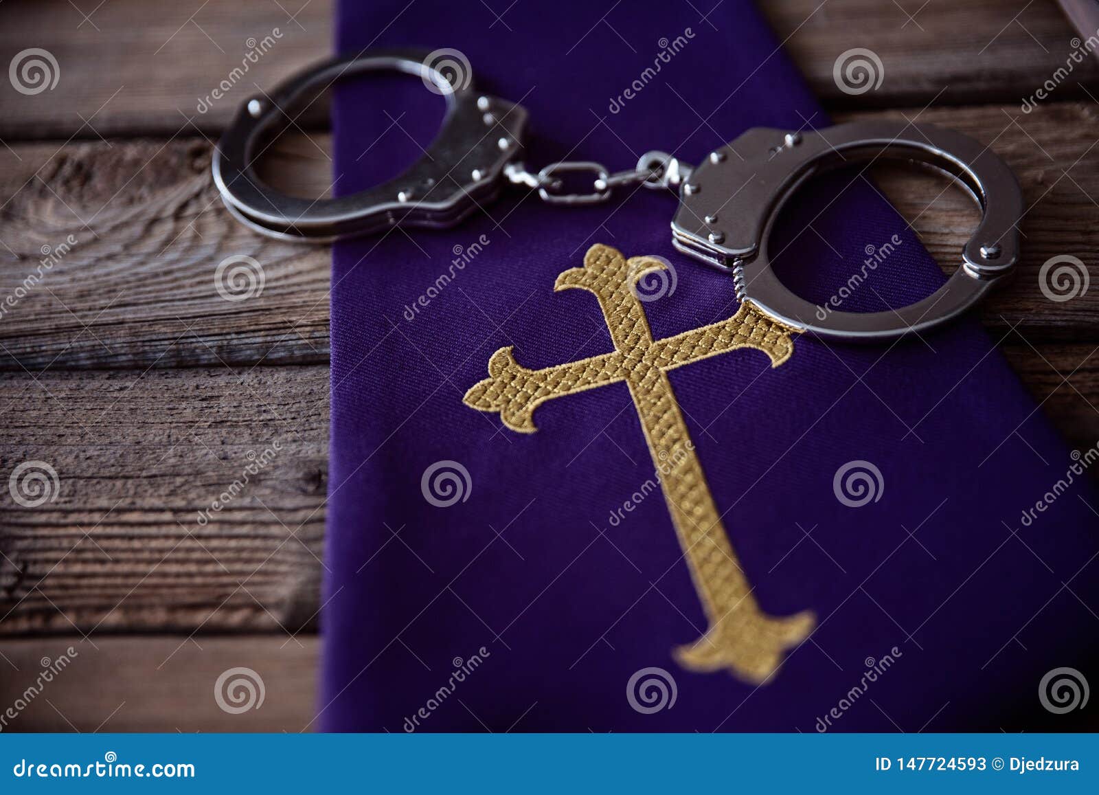 Handcuffed Catholic Priest Stock Photo | CartoonDealer.com #129912504