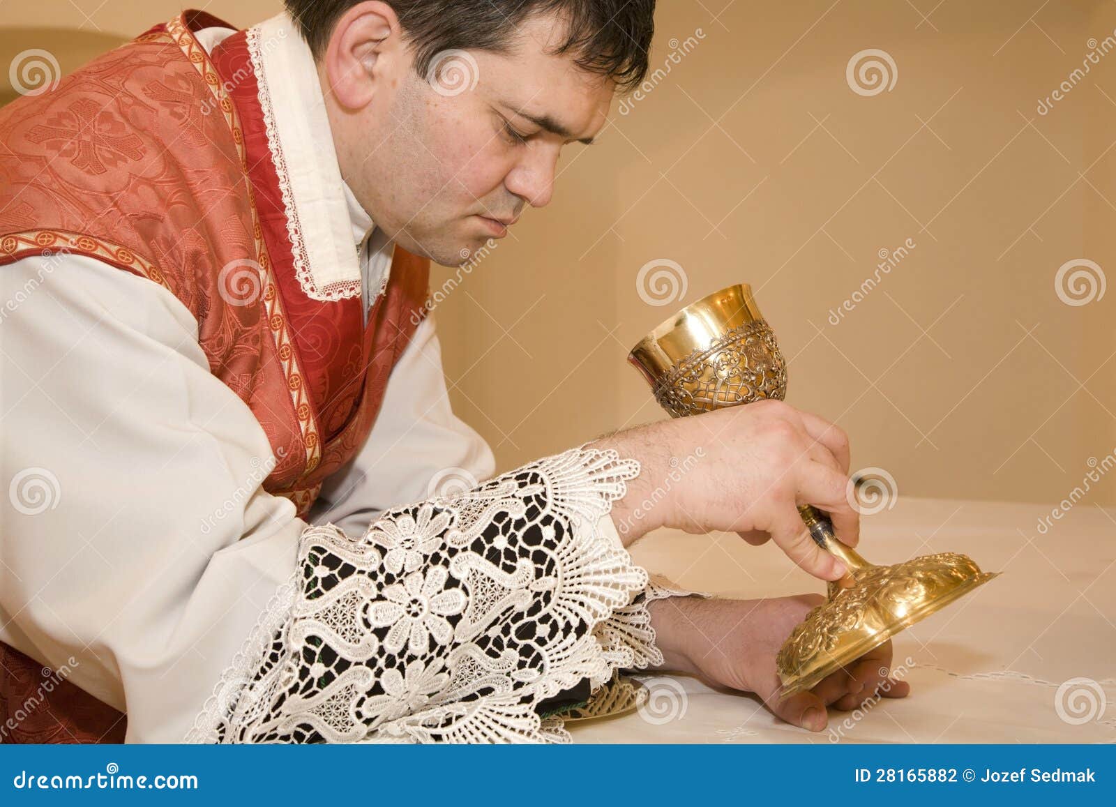 Catholic Priest by the Mass - Transfiguration Stock Photo - Image of ...