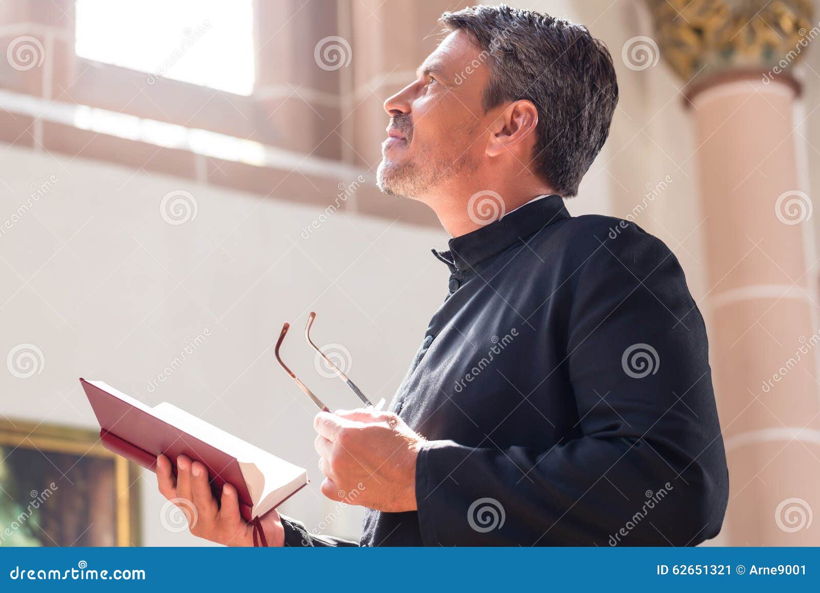 Catholic Priest Reading Bible in Church Stock Image - Image of ...
