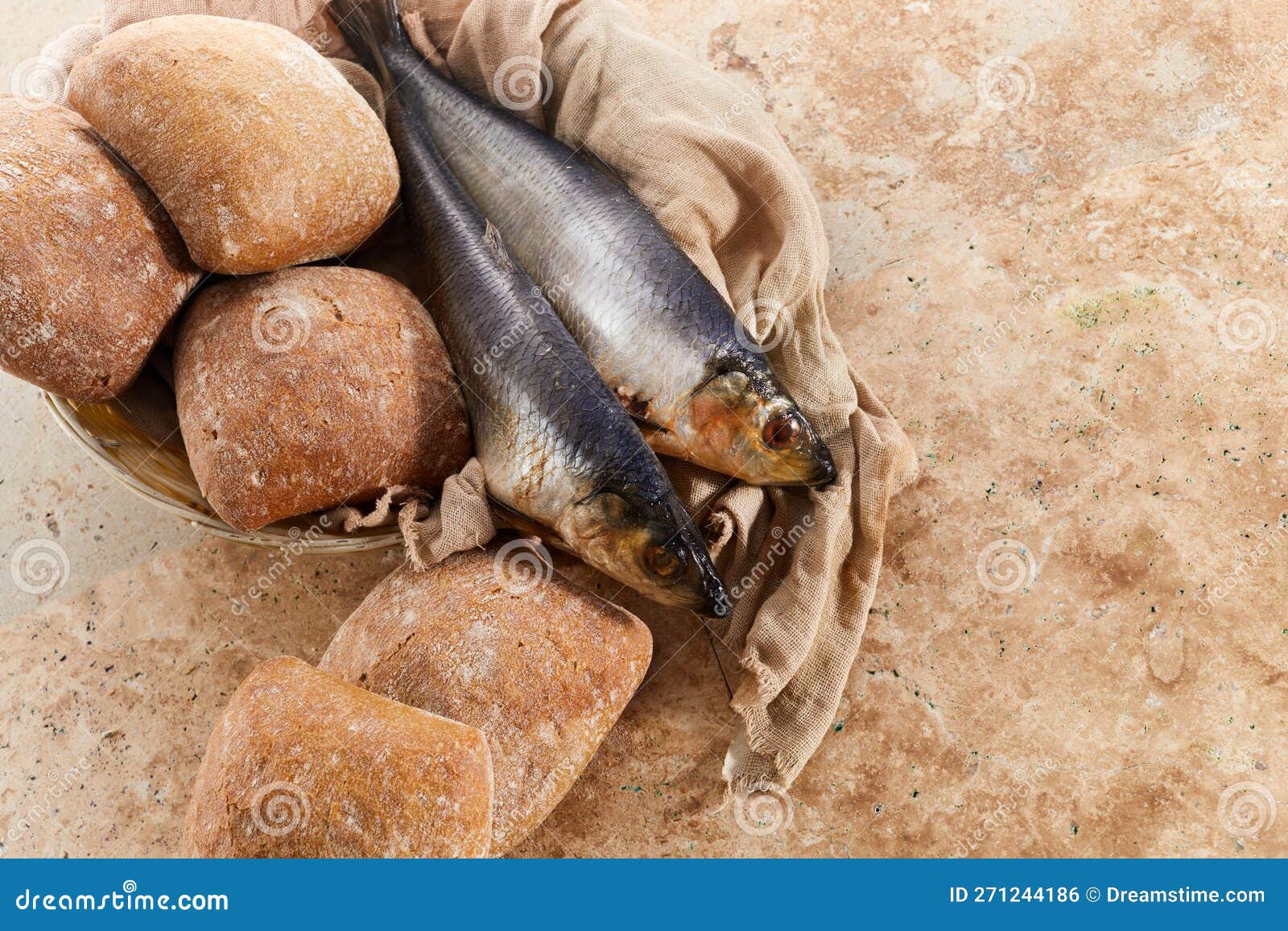 Catholic Still Life of Five Loaves of Bread and Two Fish Stock Photo ...