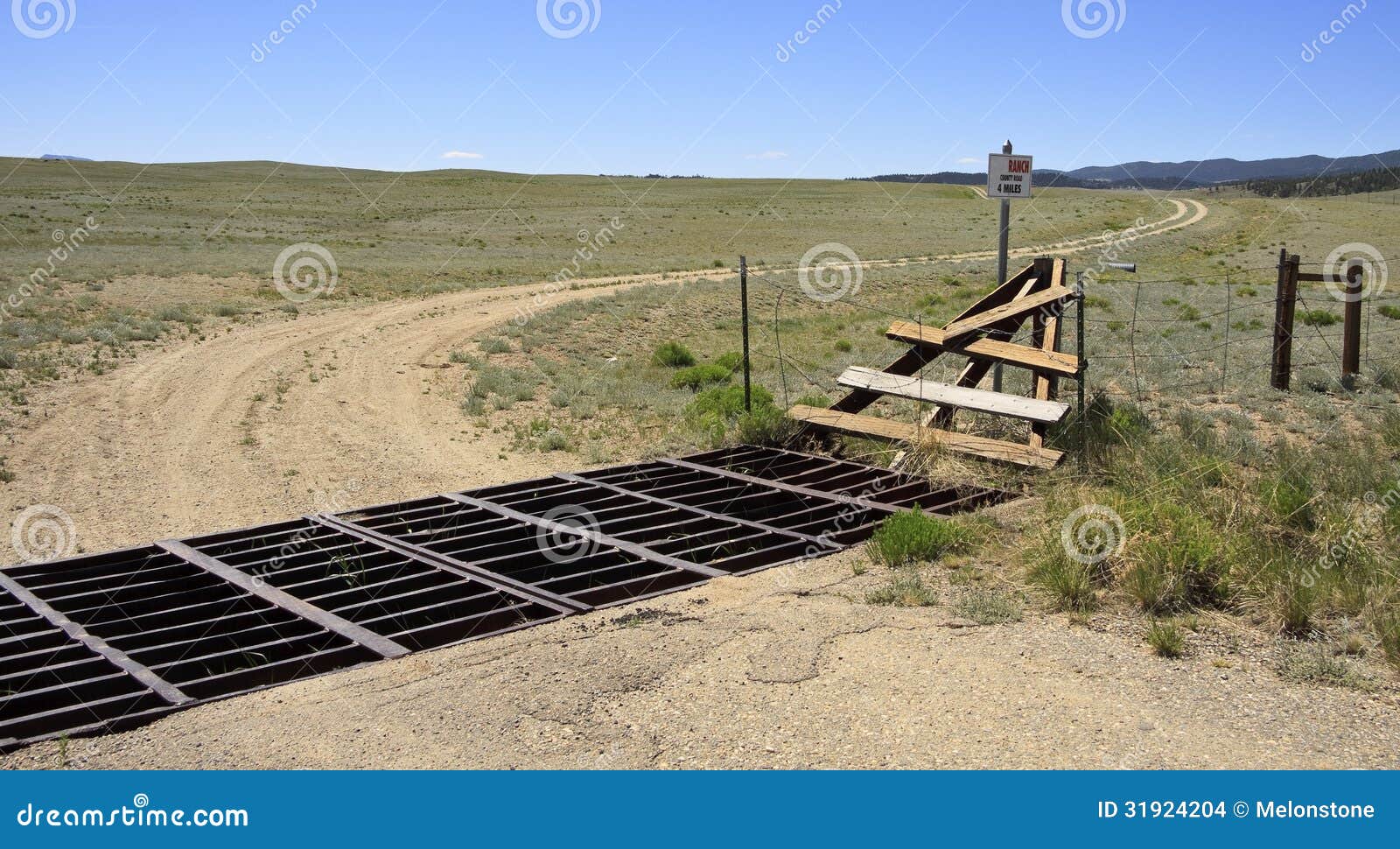 A Cattle Guard On Farm Driveway In The Mountains Royalty-Free Stock ...