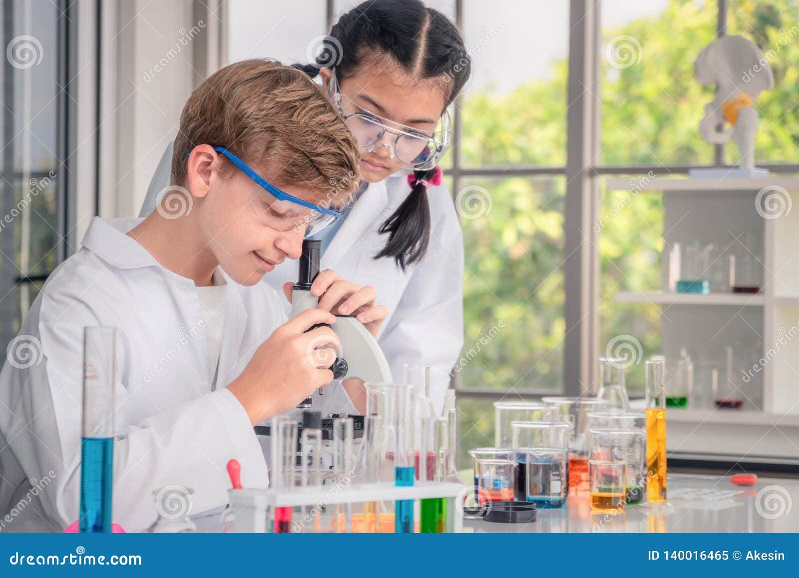 Students Using Microscope in Science Laboratory Class Stock Image ...