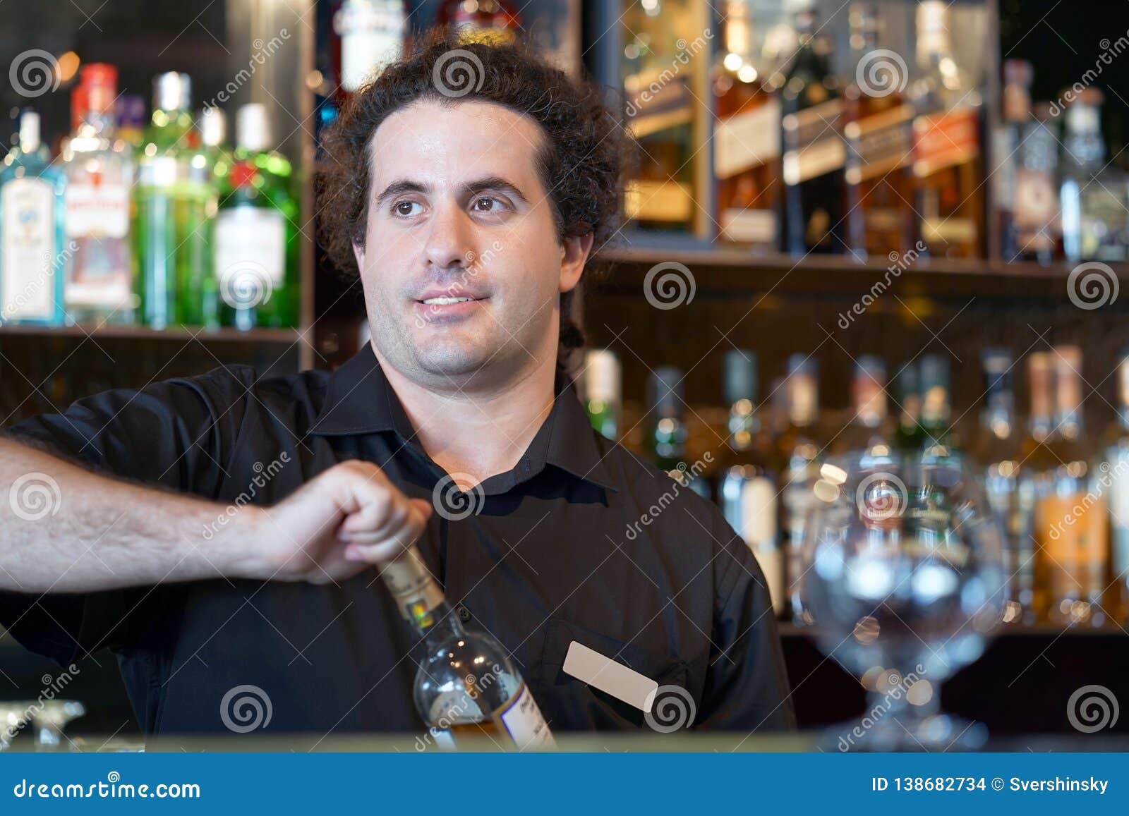Bartender Male Gives a Glass of Whiskey Stock Photo - Image of barista ...