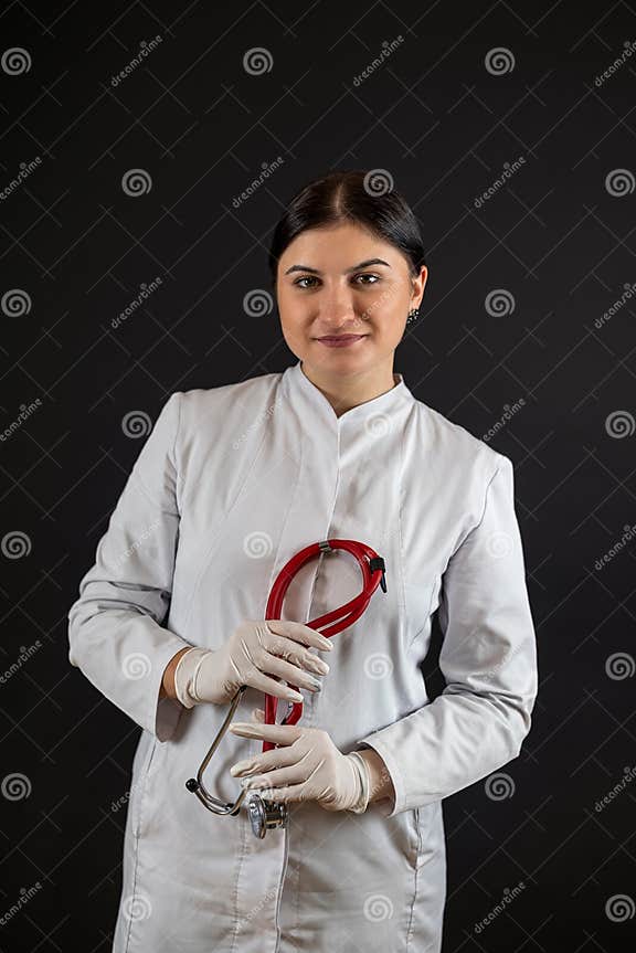 Caucasian Beautiful Female Doctor In White Coat With Stethoscope