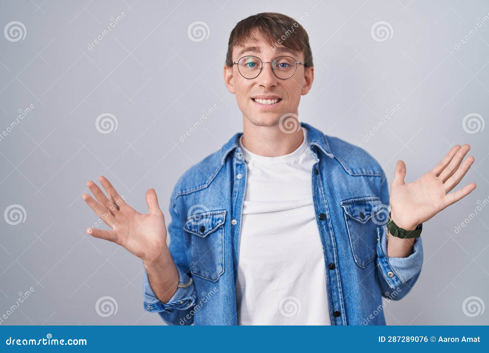 Caucasian Blond Man Standing Wearing Glasses Celebrating Crazy And