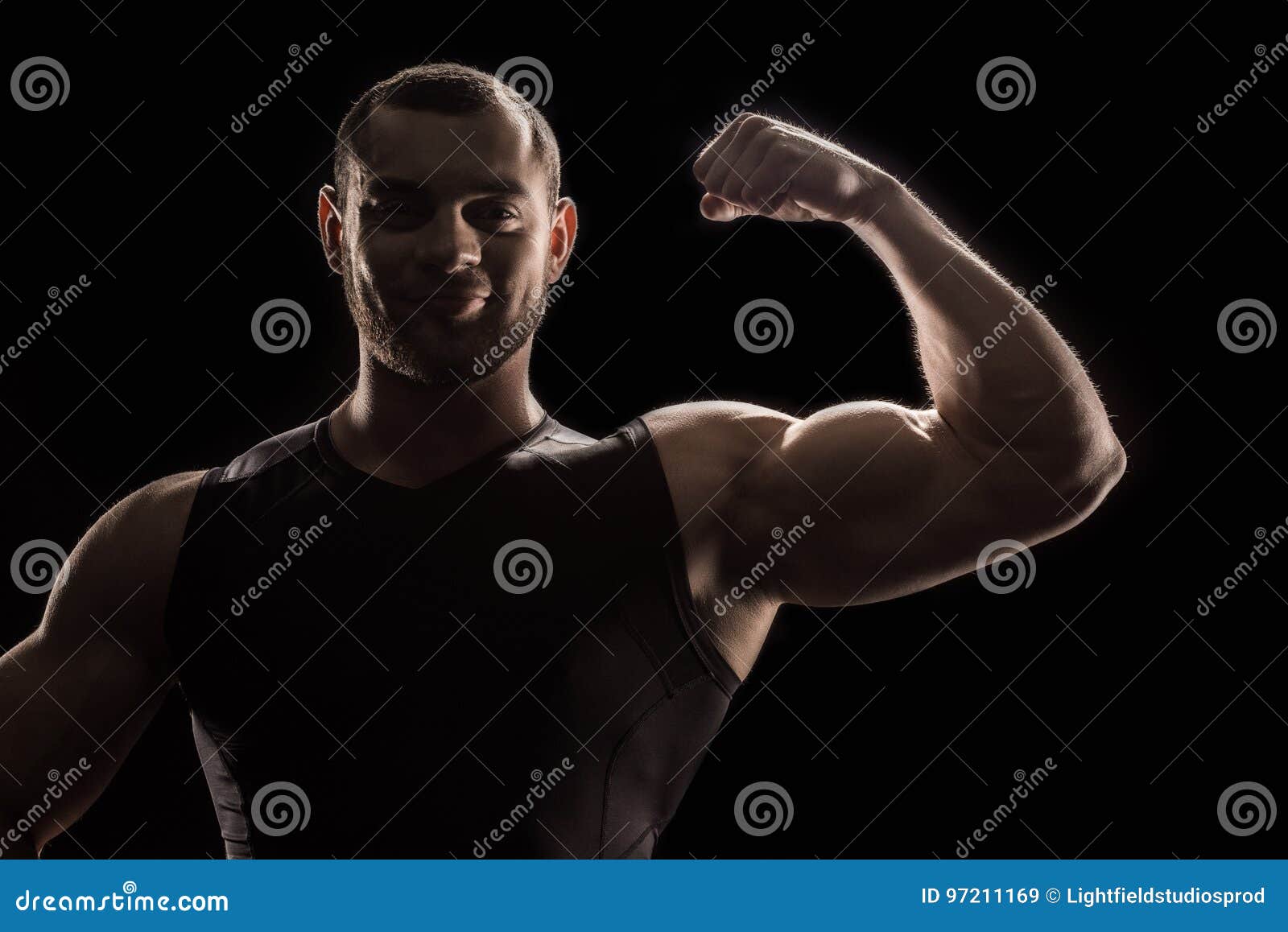 Caucasian Bodybuilder Flexing Biceps and Looking at Camera Stock Image ...