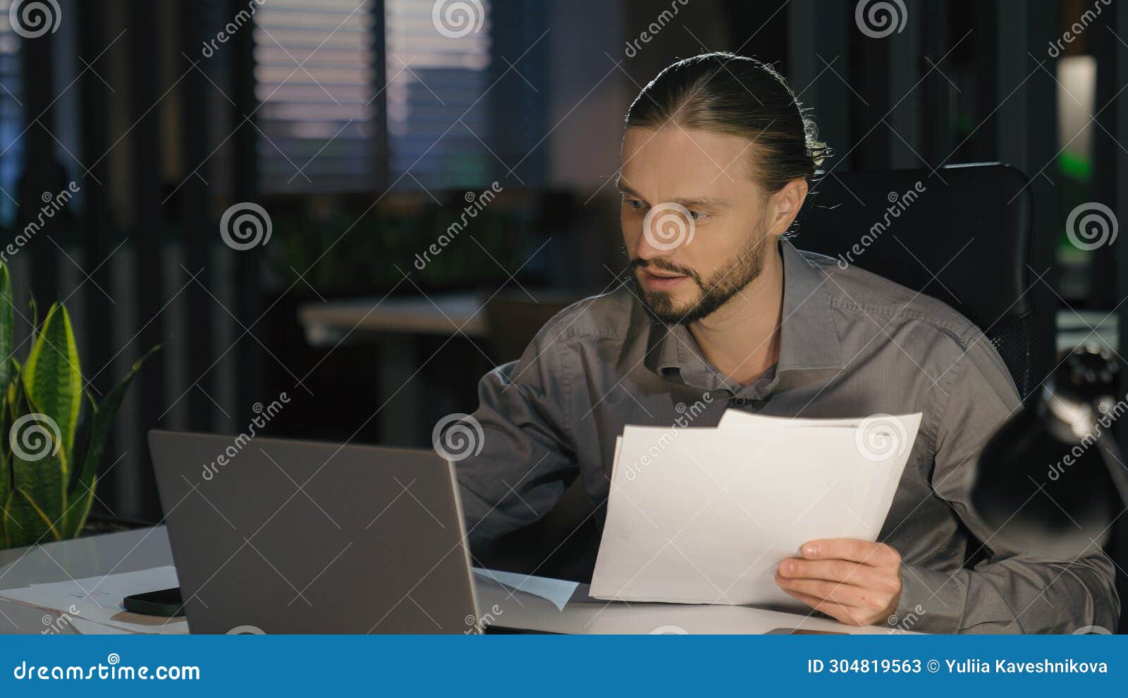 Caucasian Business Man at Evening Office Work Papers Check Documents ...