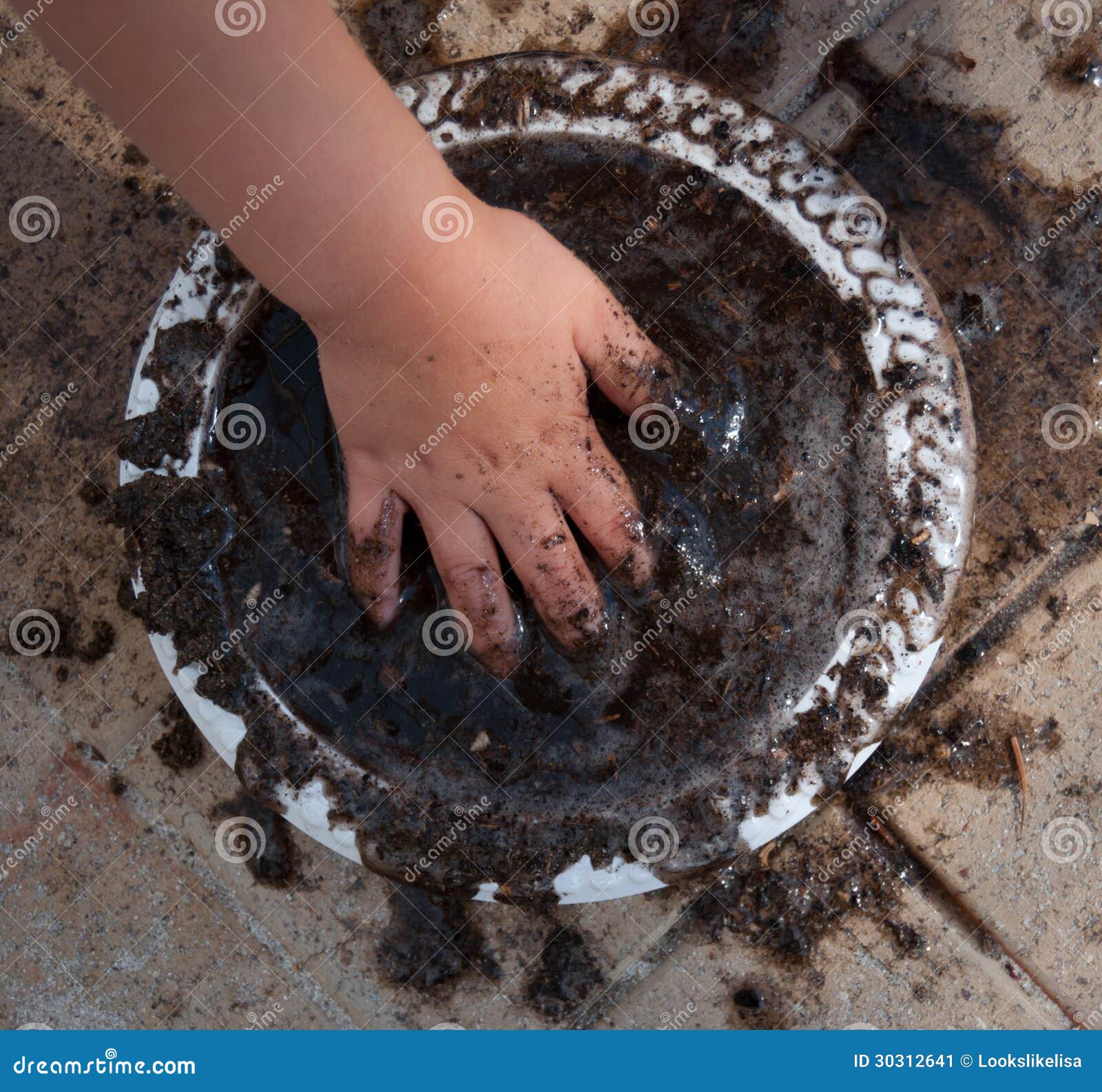Child making a mud pie stock image. Image of bowl, imagination - 30312641