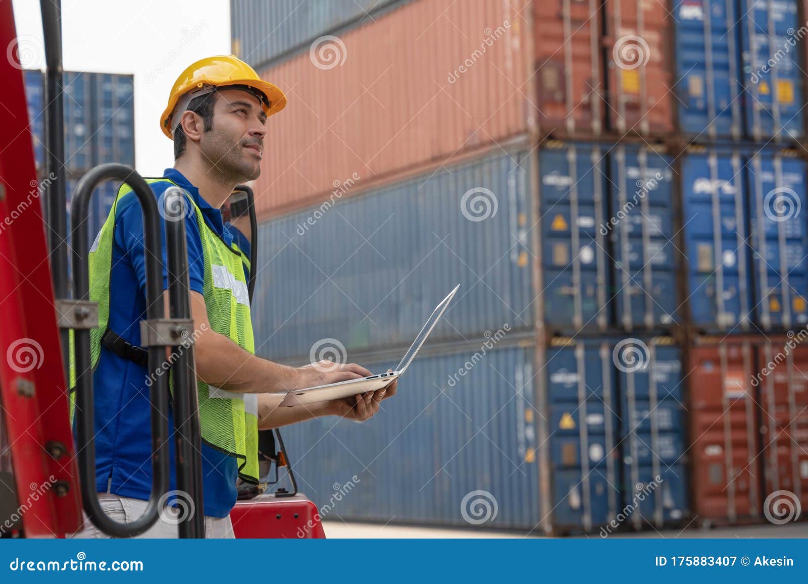 Caucasian Container Yard and Cargo Inspector at Work Checking Container ...