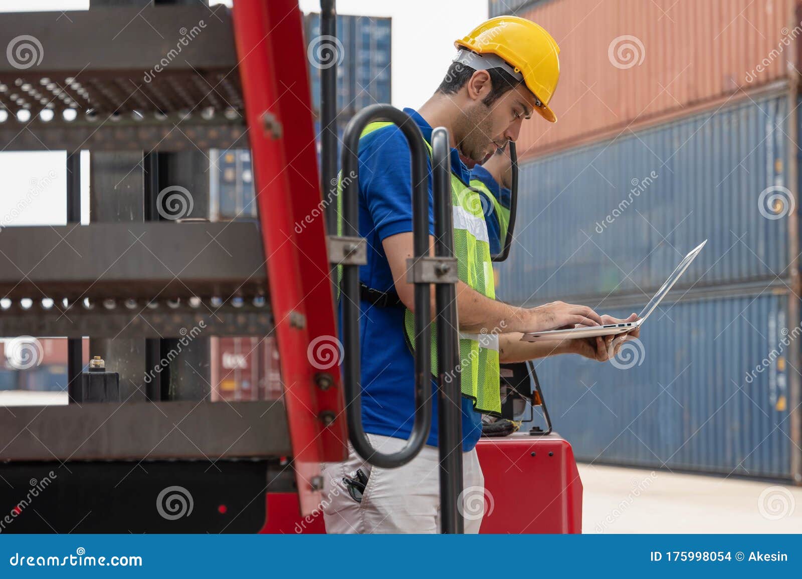 Caucasian Container Yard and Cargo Inspector at Work Checking Container ...