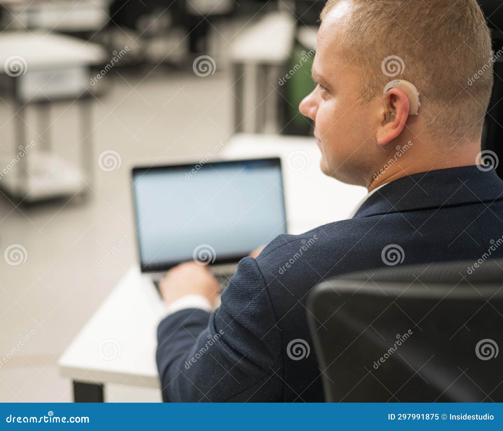 Caucasian Deaf Man Typing on Laptop in Office. Stock Image - Image of ...
