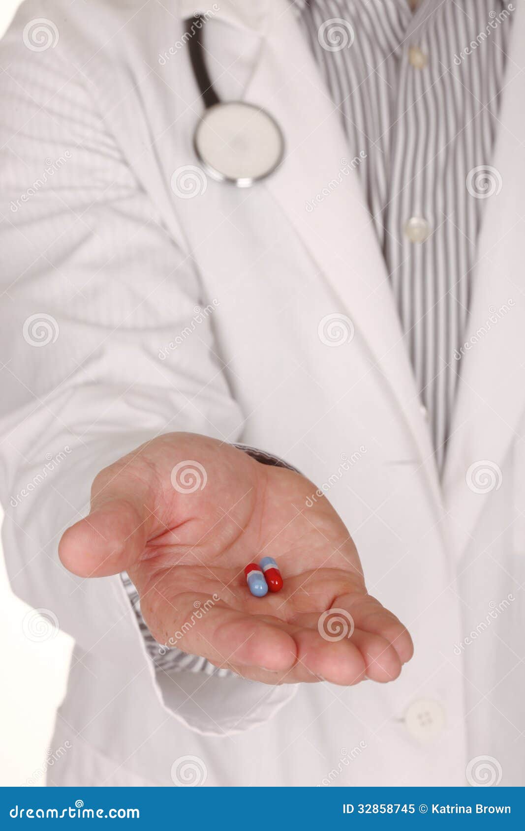 Caucasian Doctor with Medication in Hand Reaching Out Stock Image ...