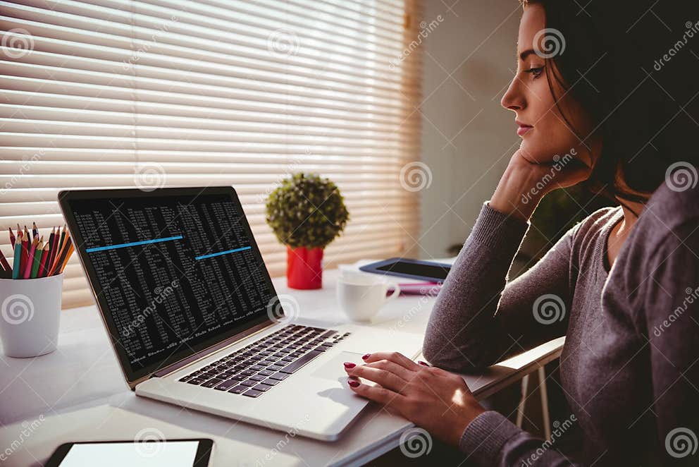 Caucasian Female Programmer Siting at Desk, Using Laptop with Coding on Screen Stock Photo ...
