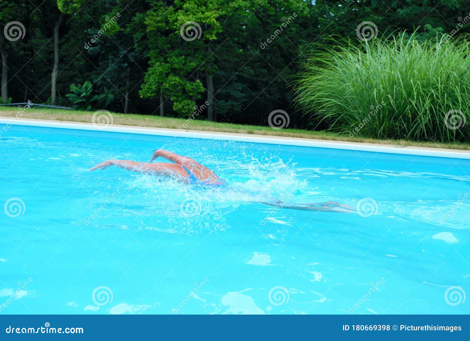 Caucasian Female Swimmer Doing Laps in a Pool Stock Photo - Image of ...