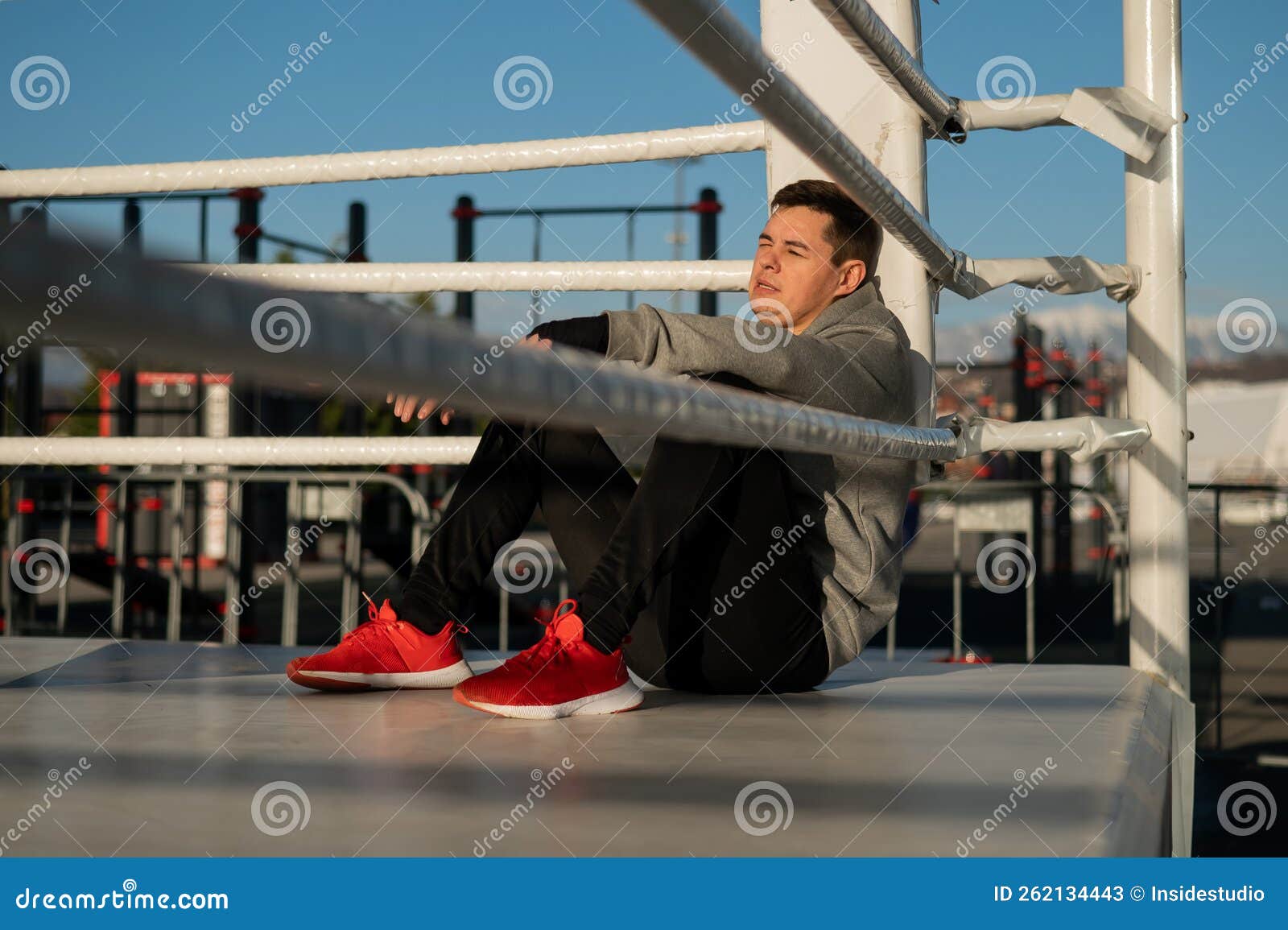 Caucasian Male Boxer Resting in the Ring Outdoors. Stock Image - Image ...