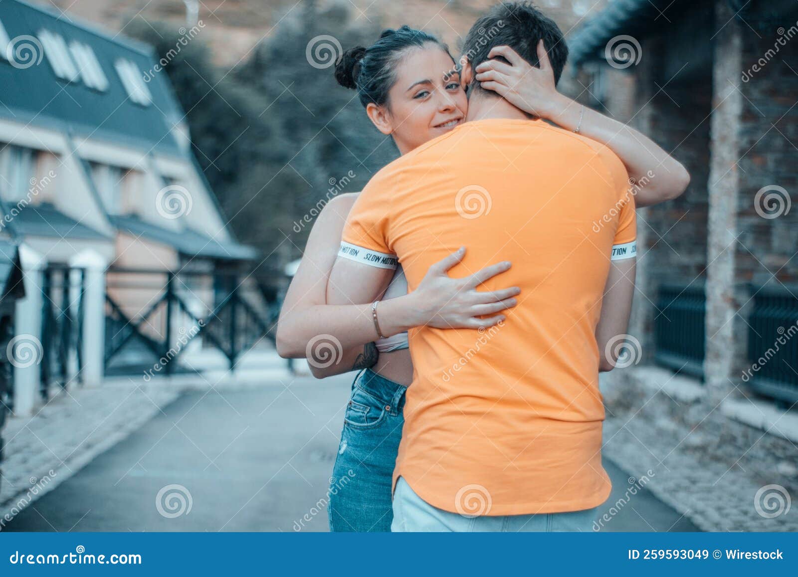 Caucasian Male And Female Couple Hugging Each Other Lovingly And