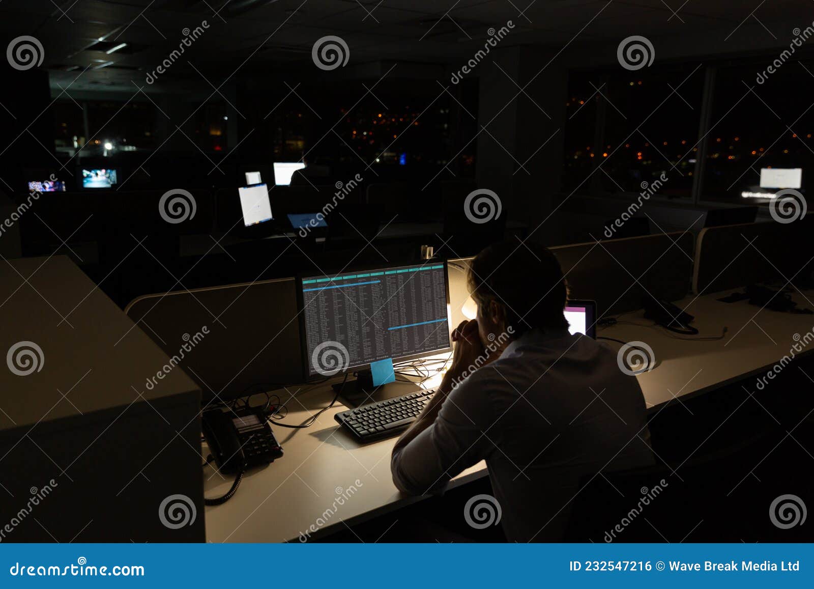 Caucasian Male Programmer Sitting at Desk, Using Computer with Coding on Screen Stock Photo ...