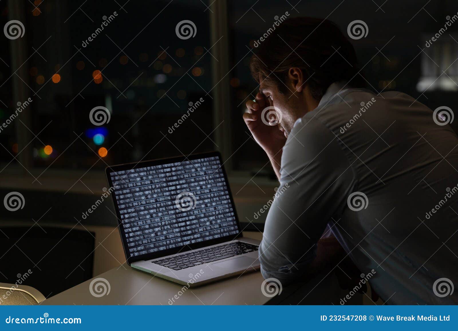 Caucasian Male Programmer Sitting at Desk, Using Laptop with Coding on Screen Stock Photo ...