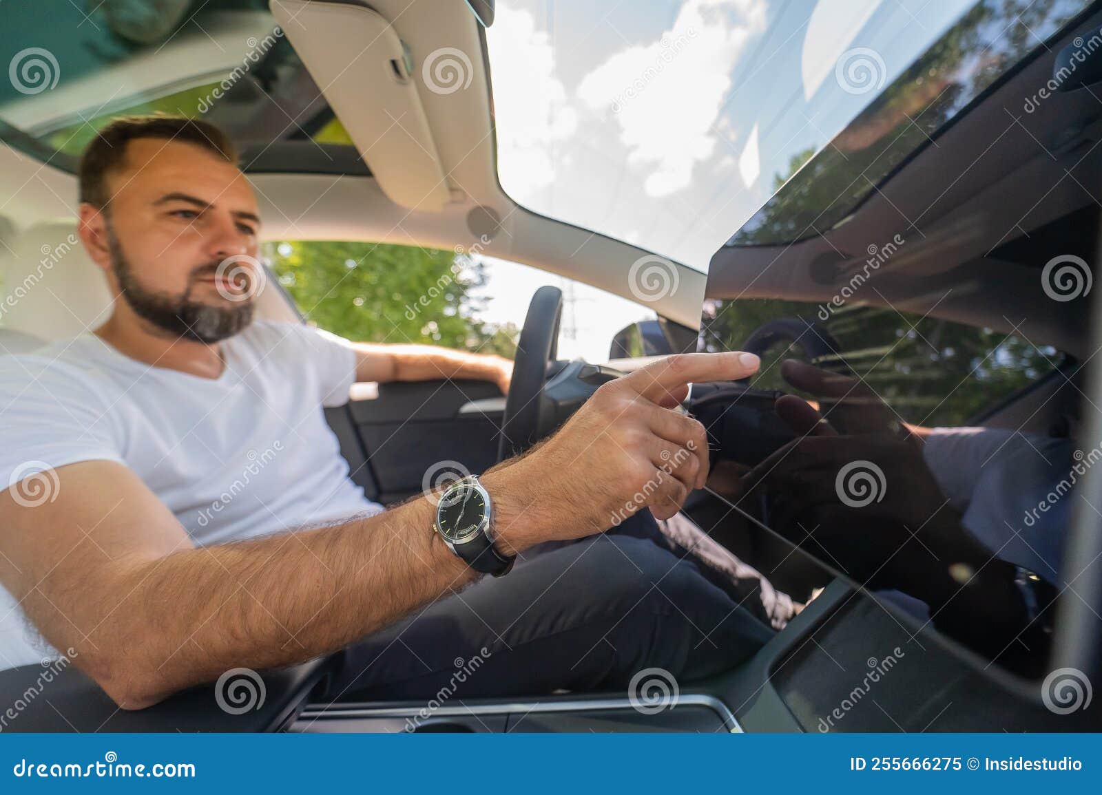 Caucasian Man Driving a Modern Electric Car. Stock Image - Image of ...