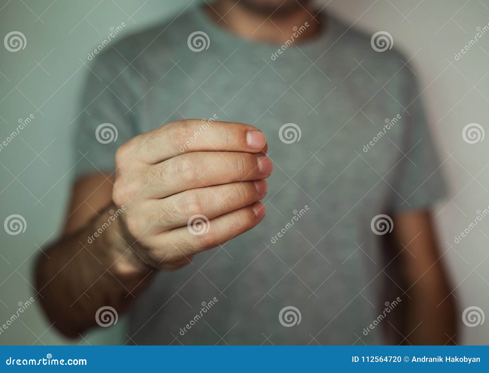 Man hand hold something. stock photo. Image of close - 112564720