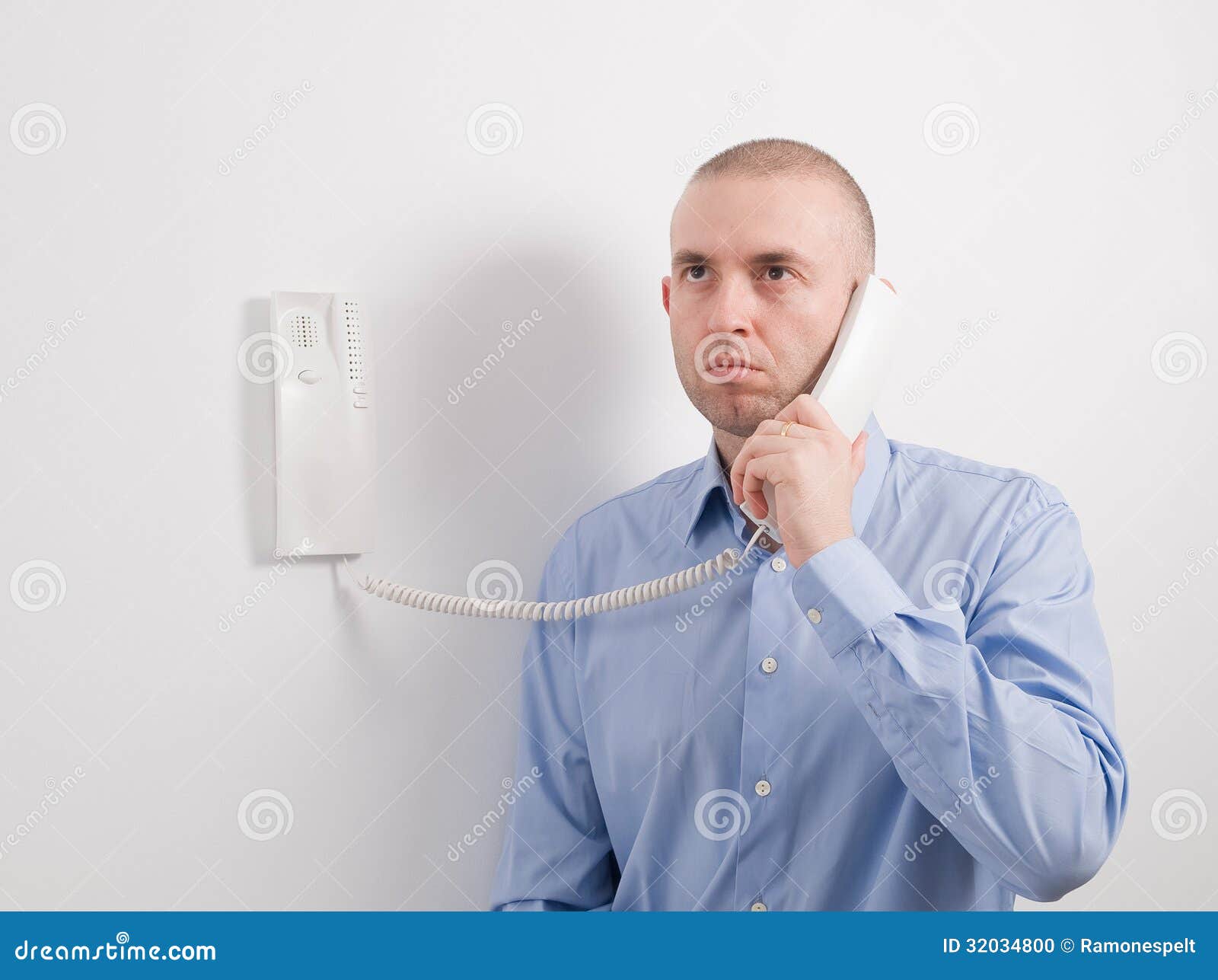 Caucasian Man Holding an Intercom Stock Photo - Image of white ...