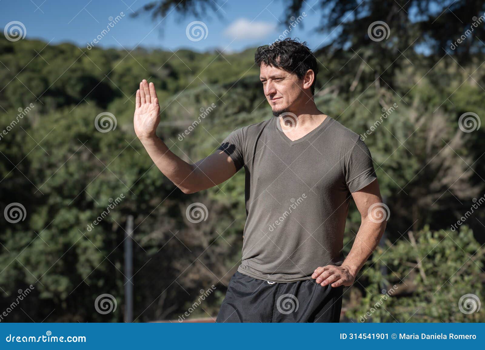 Caucasian Man Performing Gentle, Fluid Movements Combined with ...