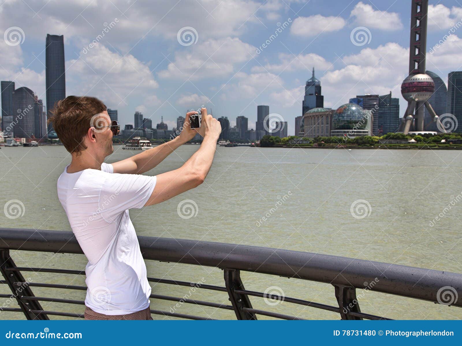 Caucasian Man Taking a Photo of the Shanghai Skyline Stock Photo ...
