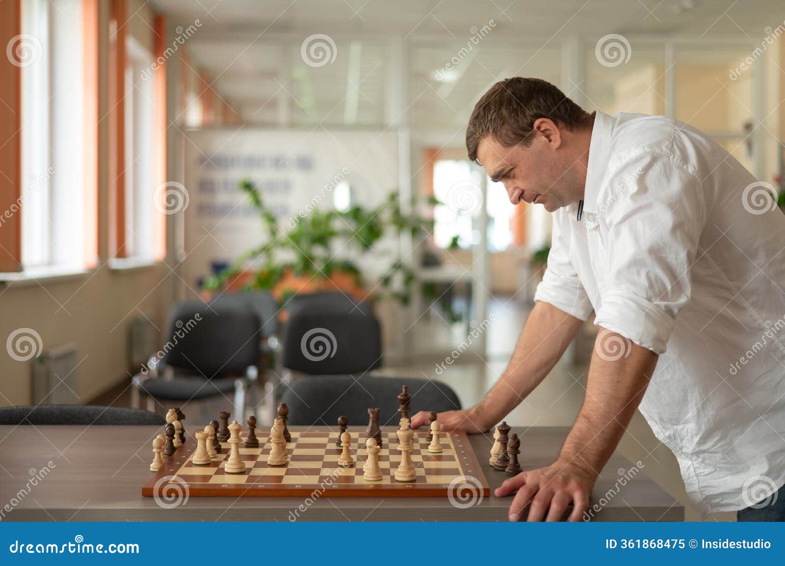 Caucasian Man Thinking about a Chess Move. Stock Image - Image of ...